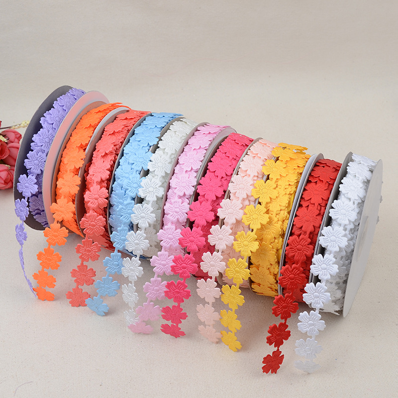Wholesale new style embossed cute flower webbing