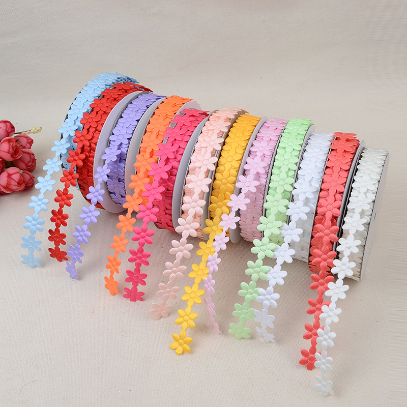 Wholesale new style embossed cute flower webbing